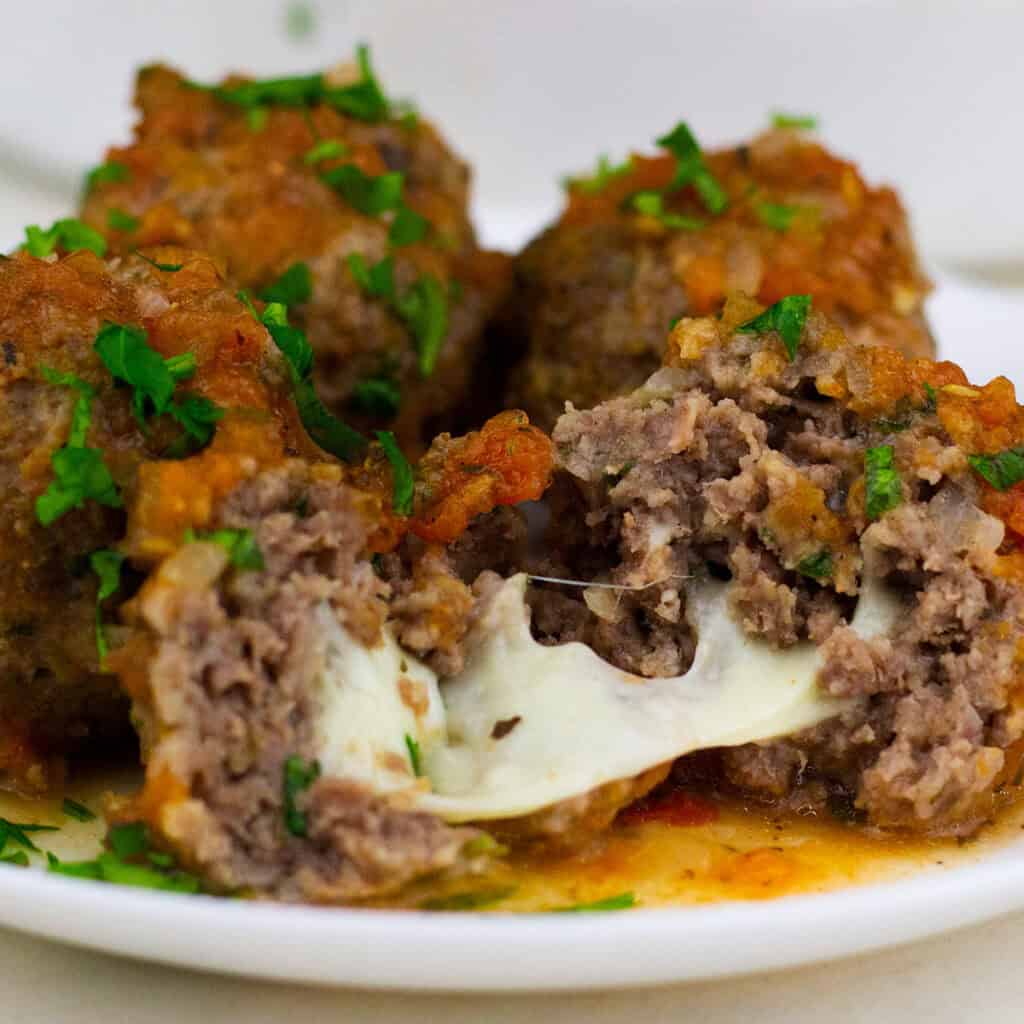 Mozzarella Stuffed Meatballs - Sunday Supper Movement